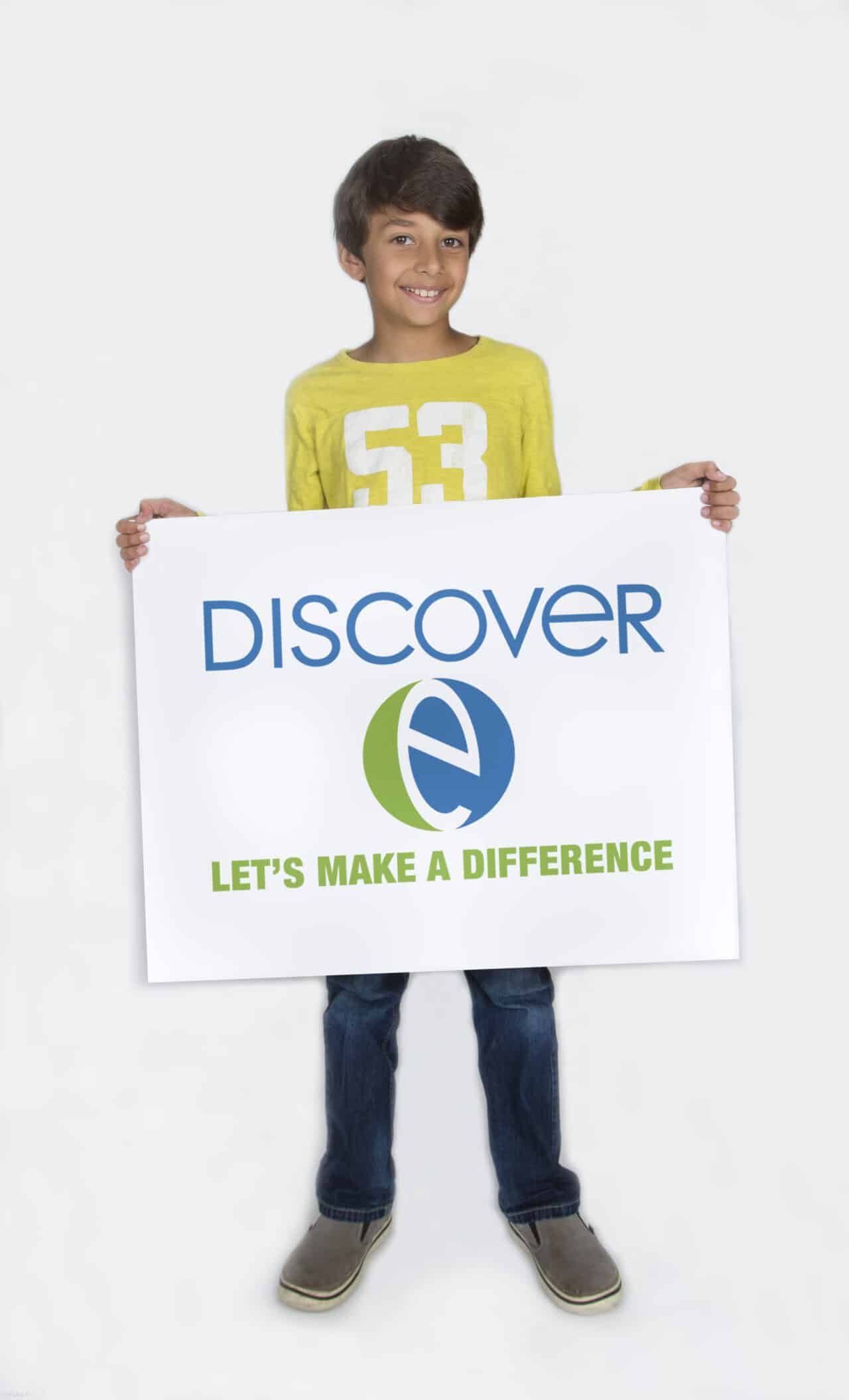 Middle School Boy Holds DiscoverE Sign - DiscoverE
